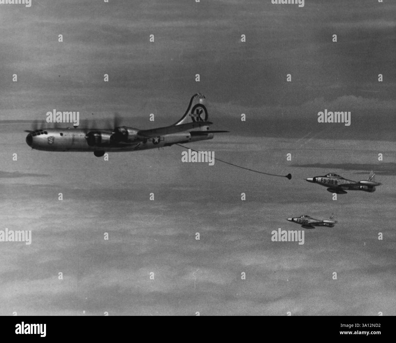 F-84 Thunderjet starts in-flight refueling from KB-29 tanker -- A U. S ...
