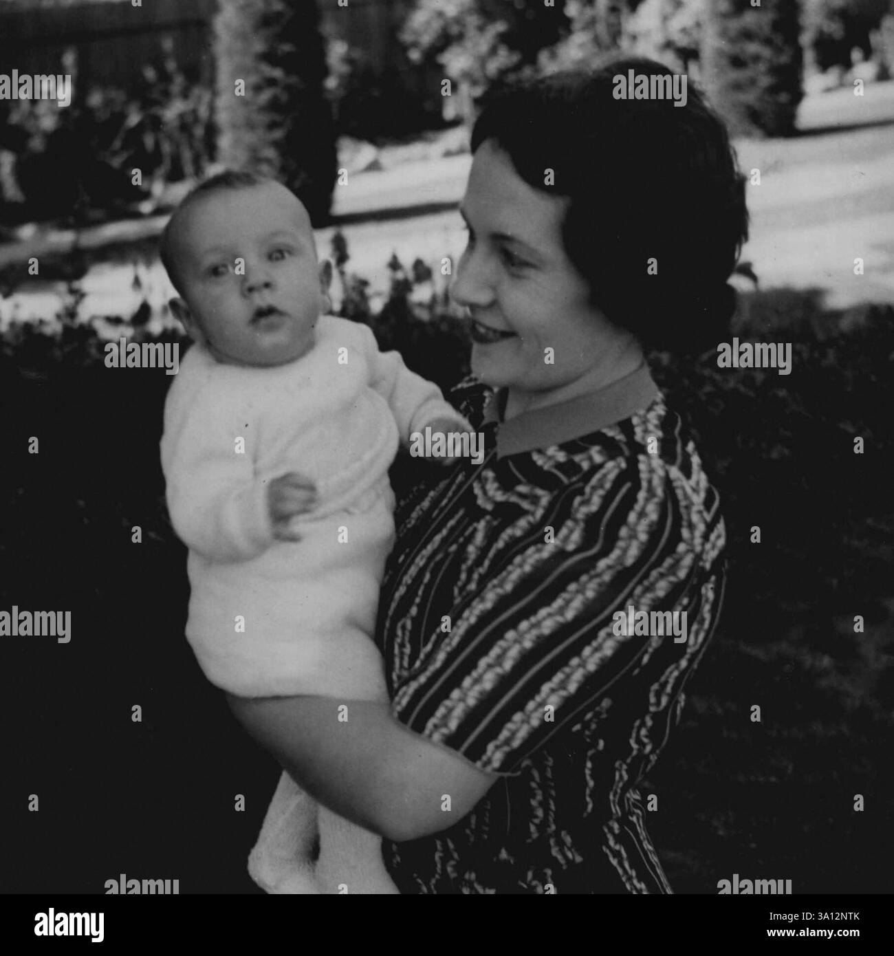 Mrs Don Bradman with four months old son John Russell Bradman. June 21 ...