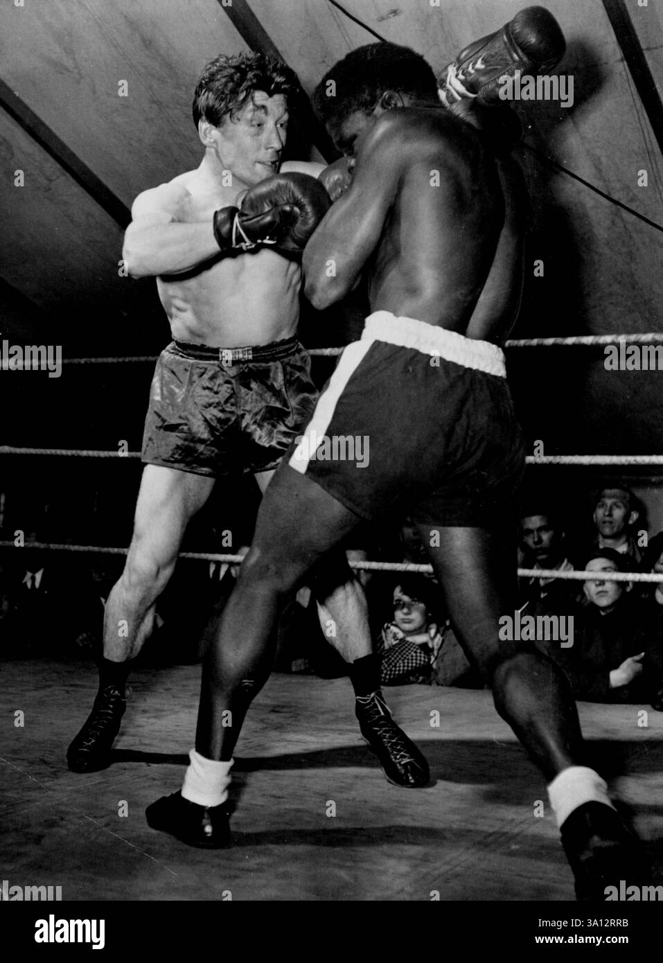 "Golden Boy" of Boxing, Eric Boon ***** Mixing it with colored boxer ***** London showground ...