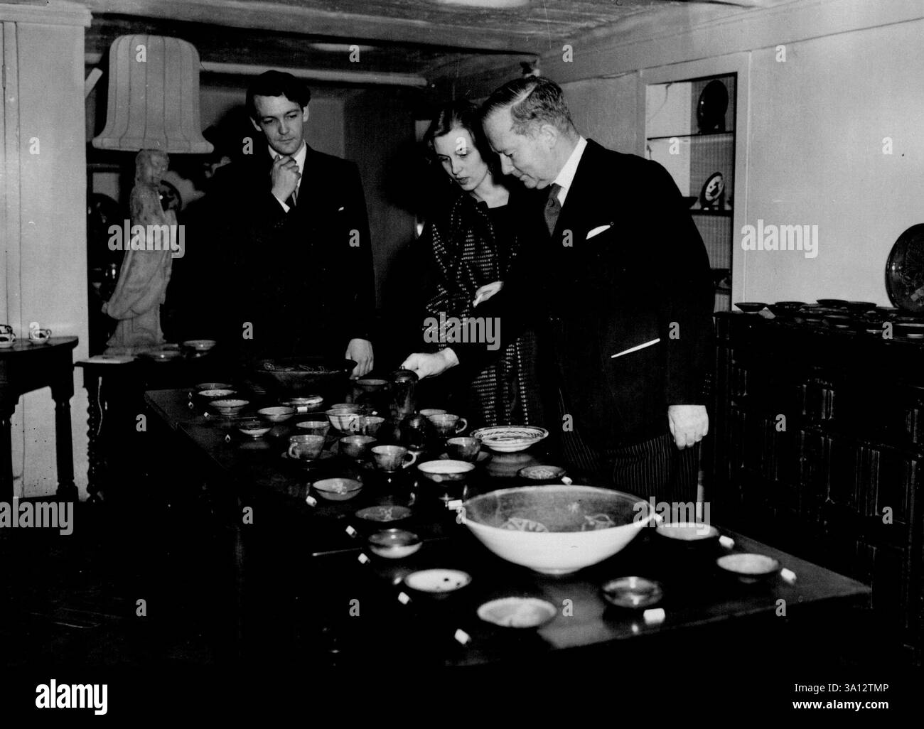 Sir Thomas Sees Their Pottery - Leading Australian potter Mr. David ...