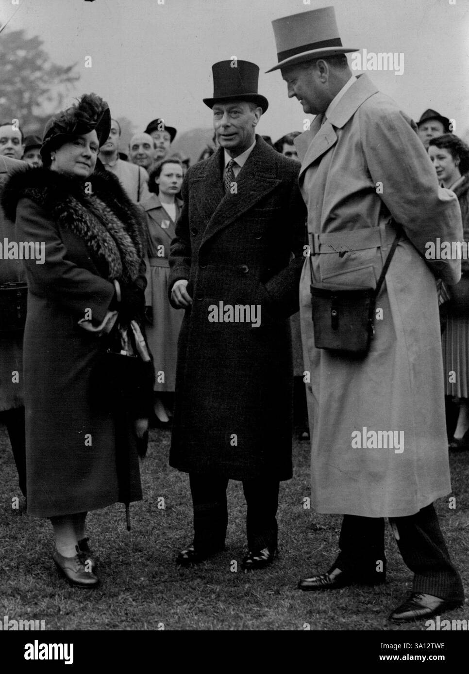 Their Majesties the king and queen talking with captain Boyd Rochfort ...