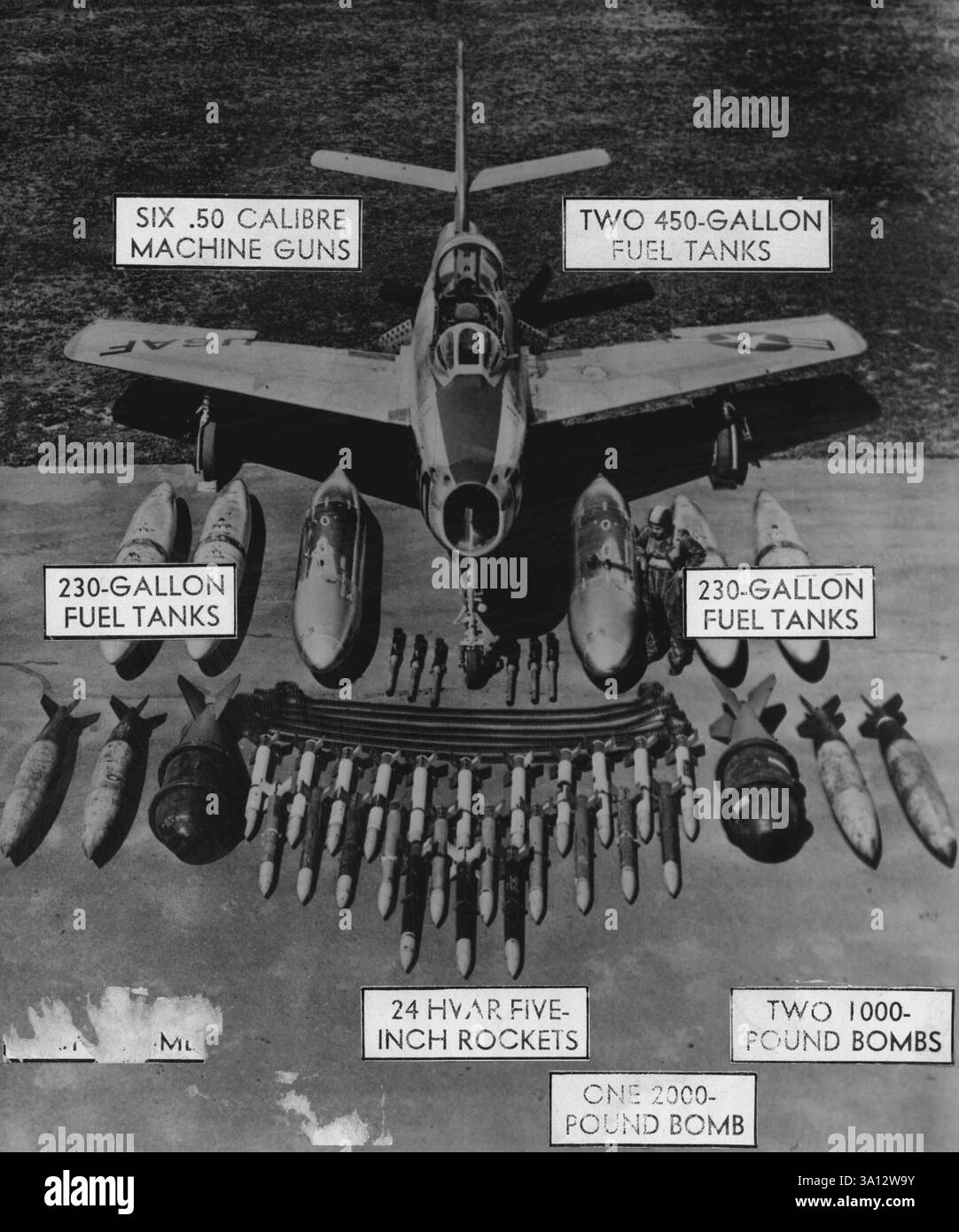 The pilot is hard to find in this display of armament and fuel tanks ...
