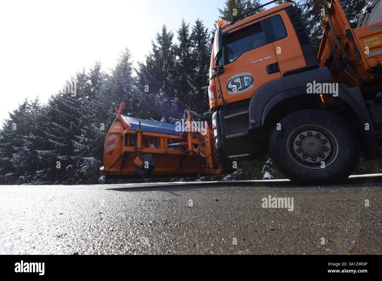 snowplow on country road, snow clearing vehicle in winter service snow ...