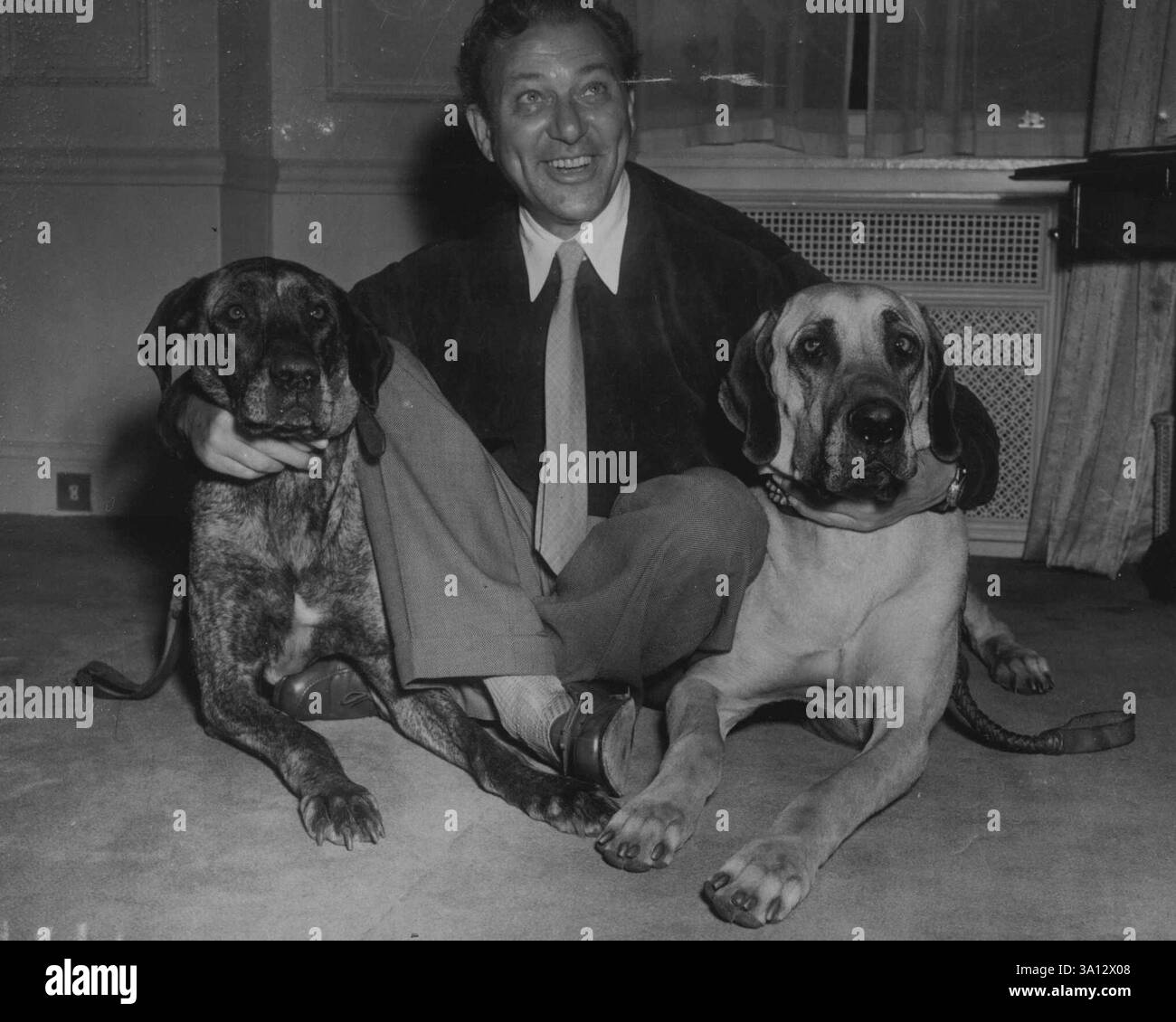 Carl Brisson Arrives in London. Photo Shows : Carl Brisson with two ...