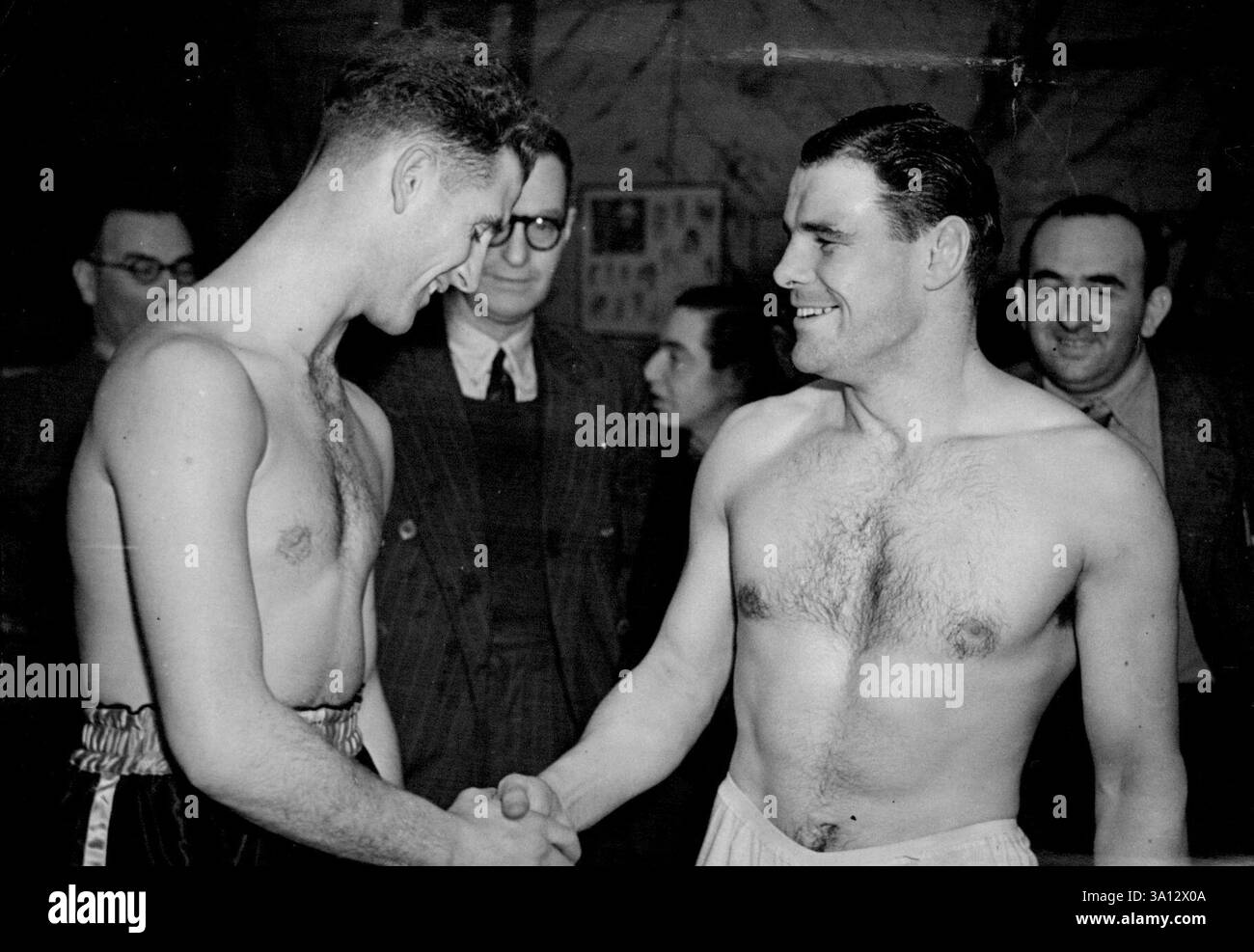 Murphy is New Empire Title Holder: Vince Hwakins (right) the British middle-weight champion, who ...