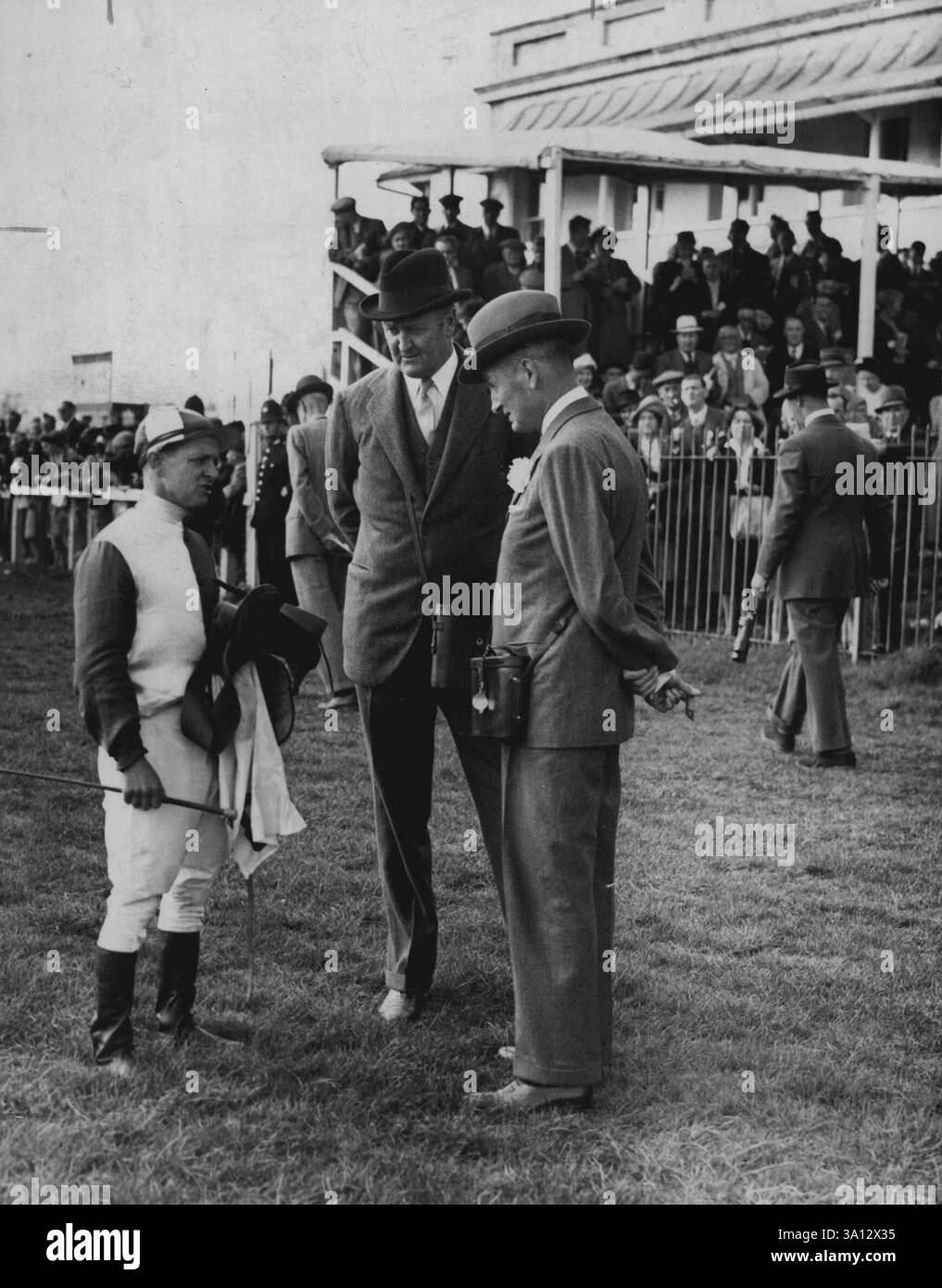 Talking Shop At Epsom Australian Jockey Edgar Britt (Left) and Caption ...