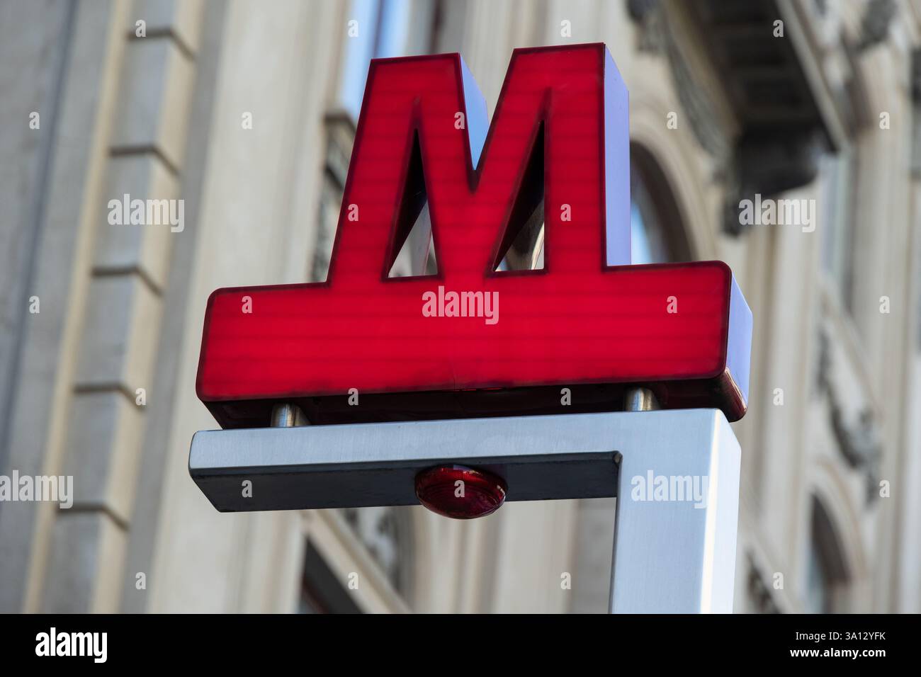 View of Metro line logo at an entrance.The Copenhagen Metro is a light ...