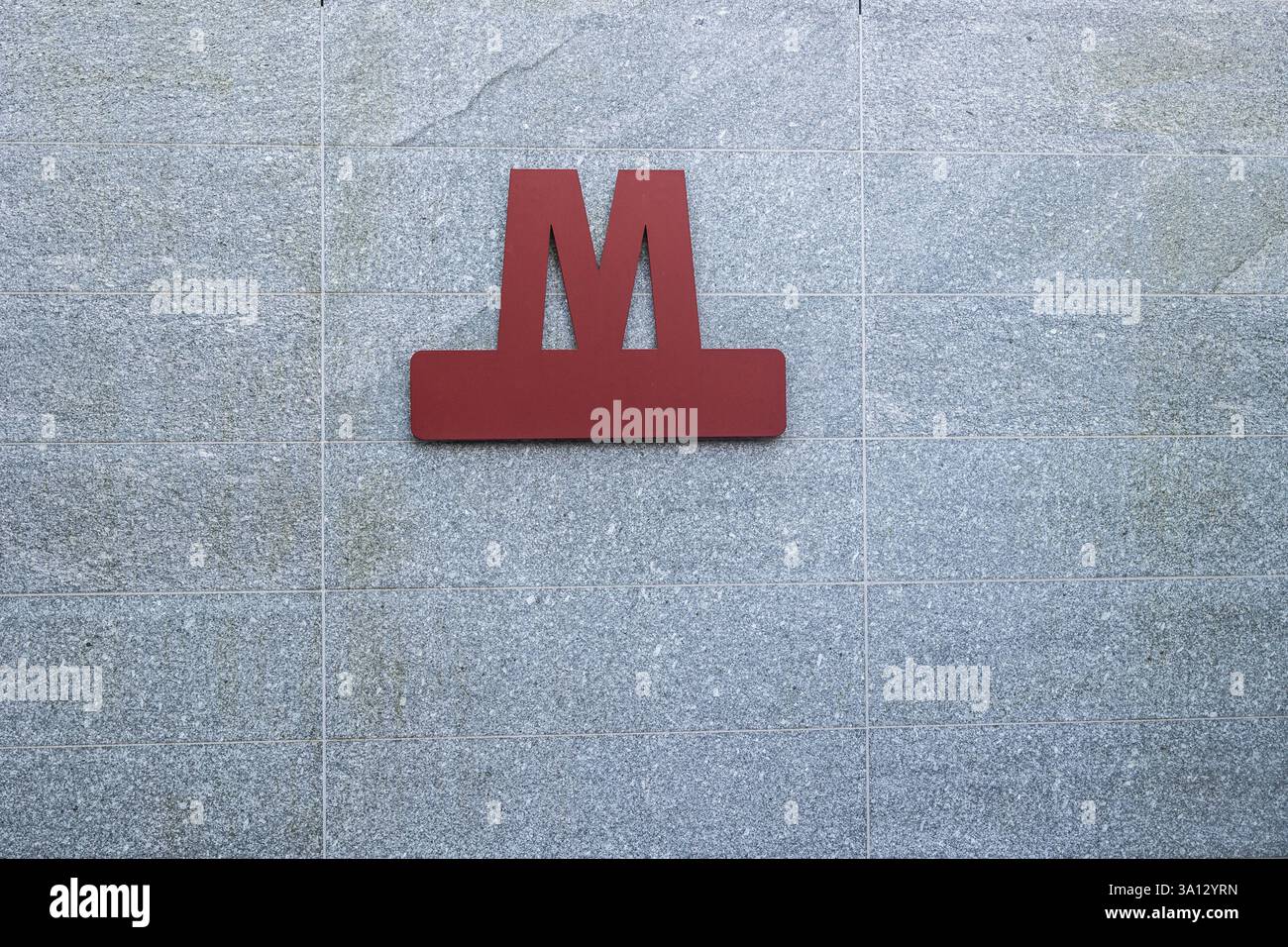 View of Metro line logo at an entrance.The Copenhagen Metro is a light ...