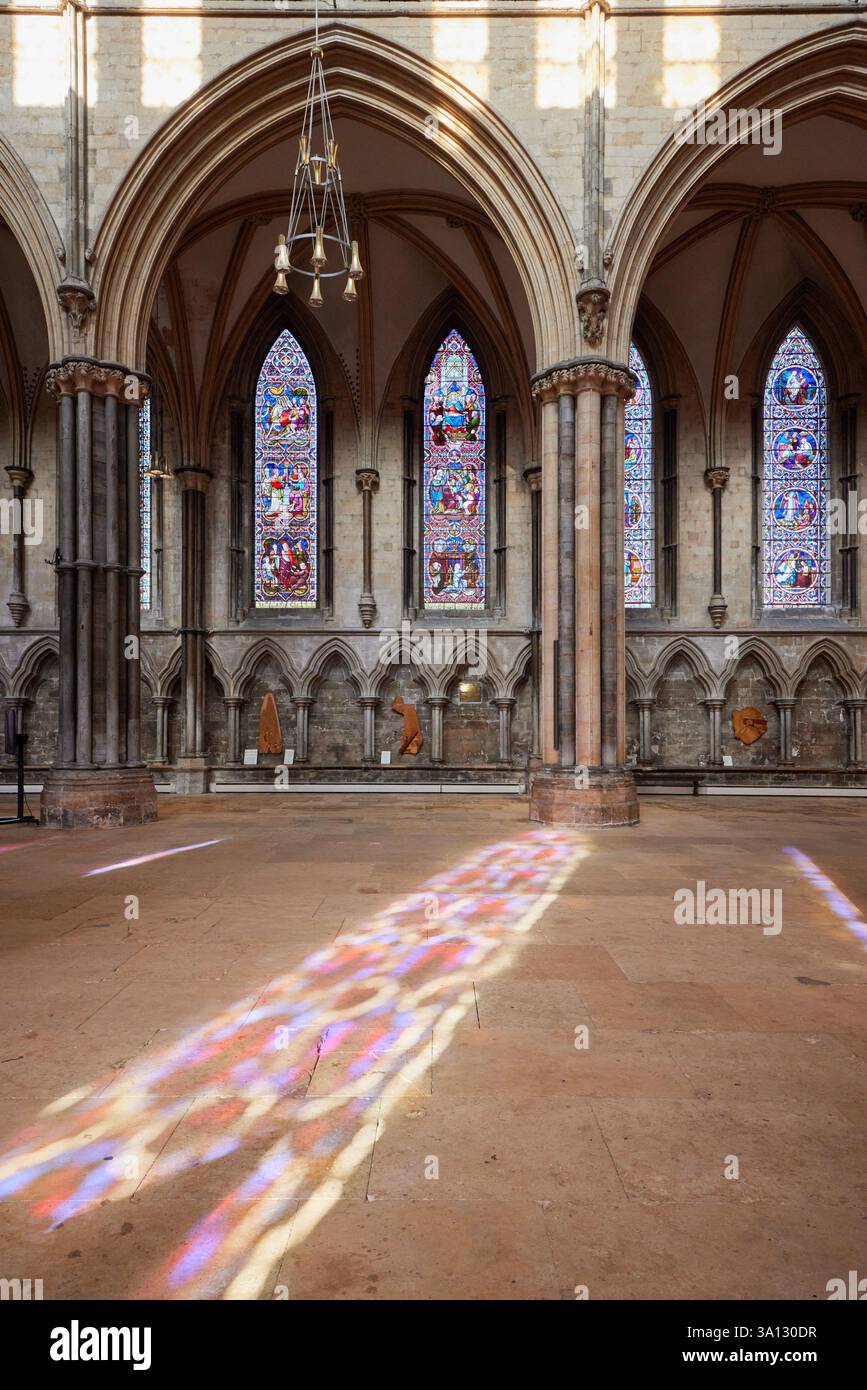 A detailed view of Lincoln Cathedral’s nave, showcasing intricate stone ...
