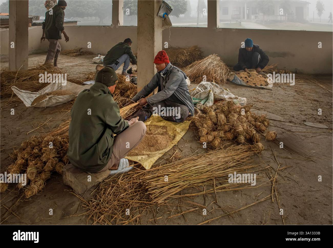 Chitwan National Park, Nepal - February 6th 2025 - Staff members making ...
