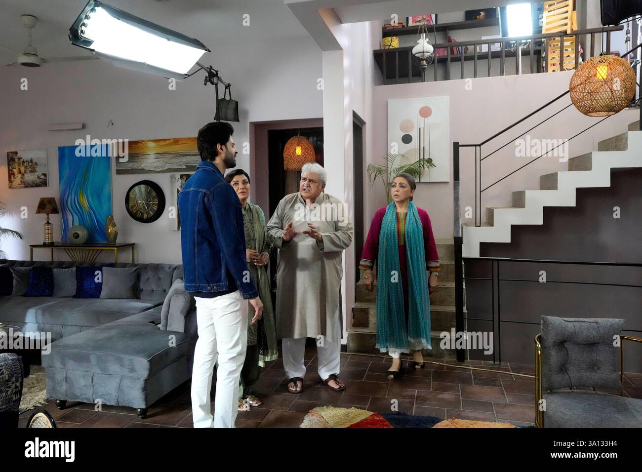 Pakistani actor and producer Khalid Anam, center, performs with Saad ...