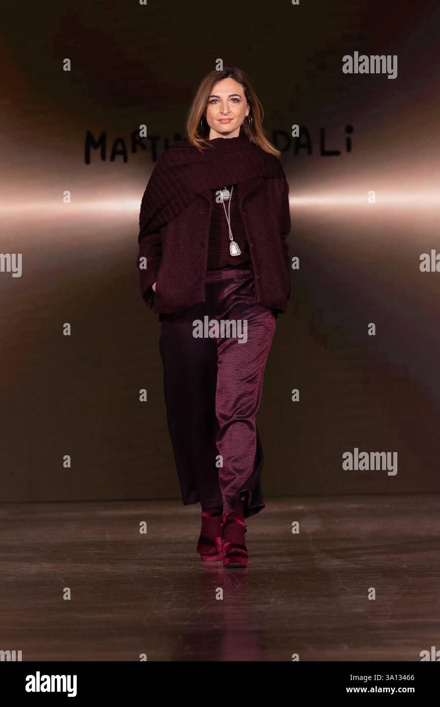 Milan, Italy. 24th Feb, 2025. A model walks the runway during the ...
