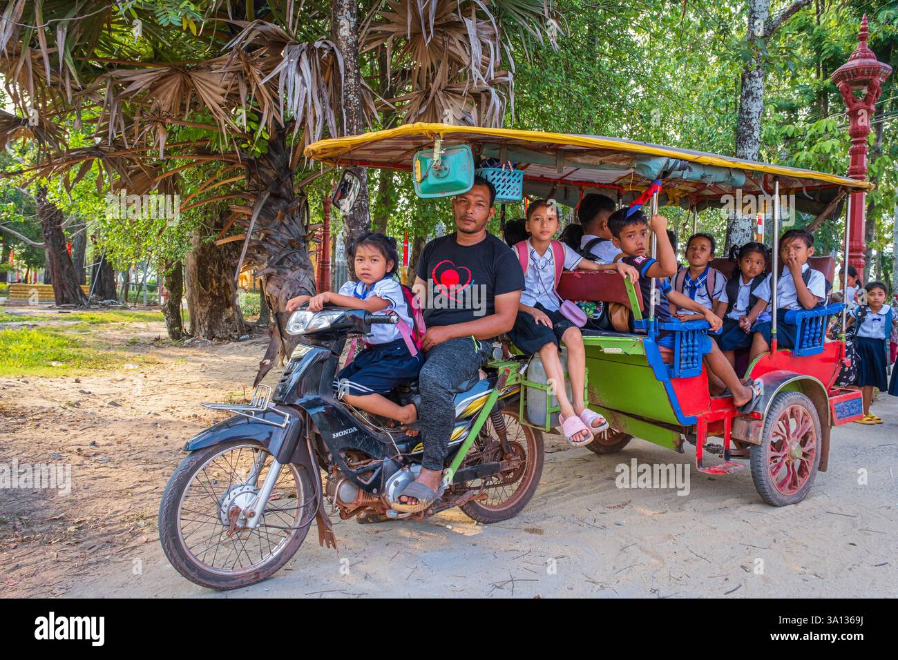 Cambodia, Kampot province, Kampot, Traeuy Kaoh or Fish Island, school transport Stock Photo - Alamy