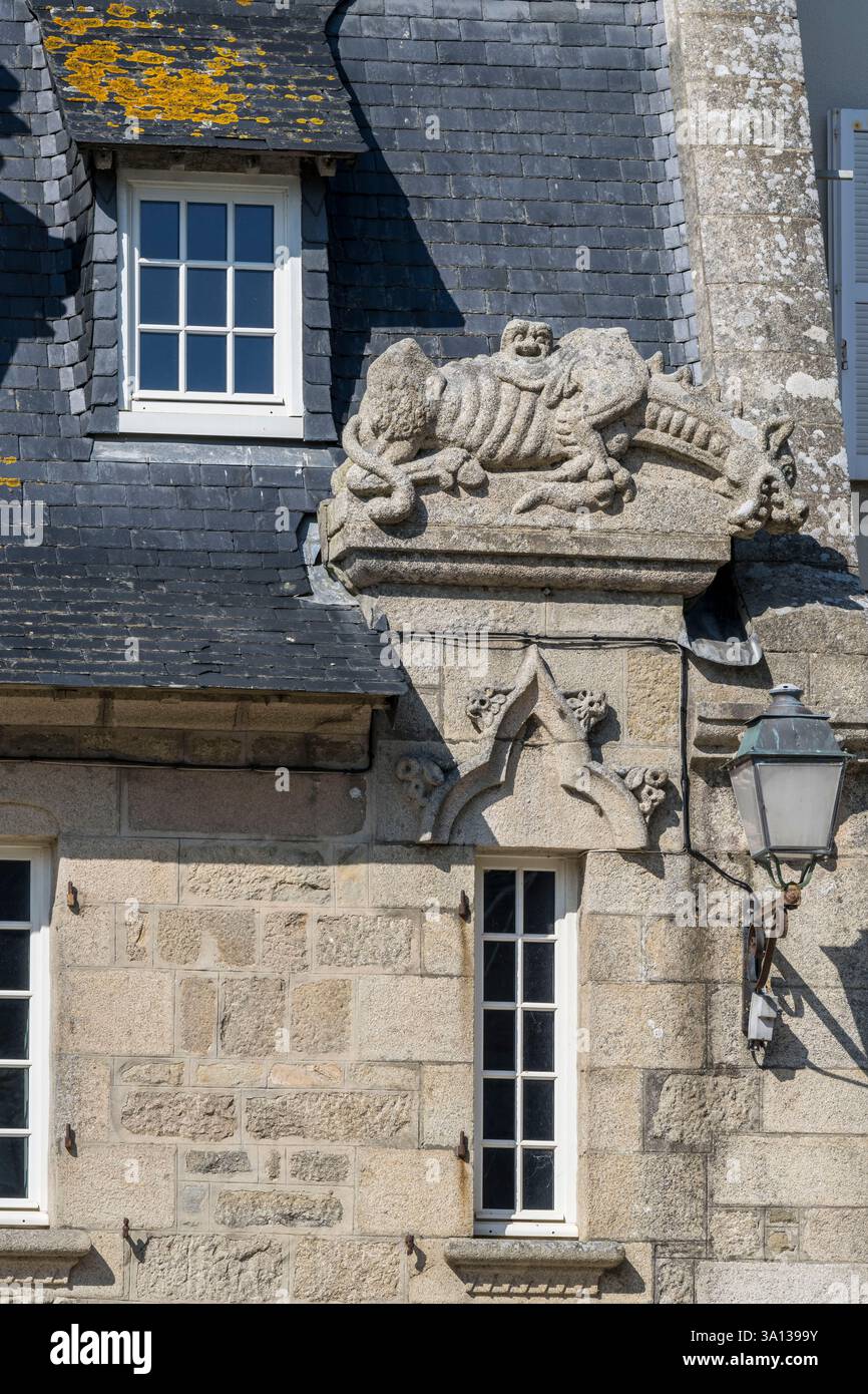 France, Finistère, Roscoff, carved dormer window of an old shipowner's ...
