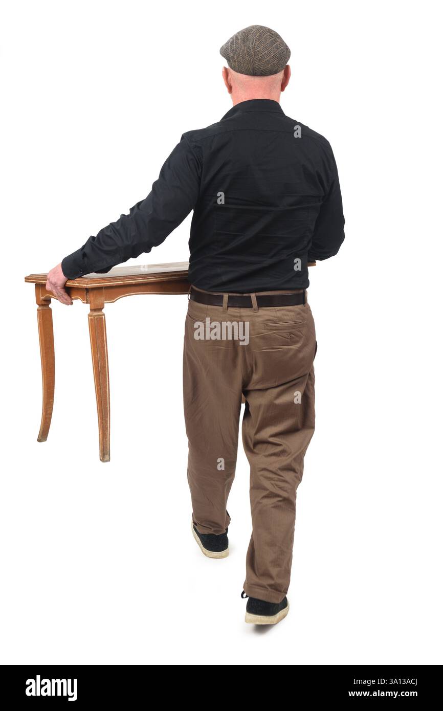 back view of a man walking holding table on white background Stock ...