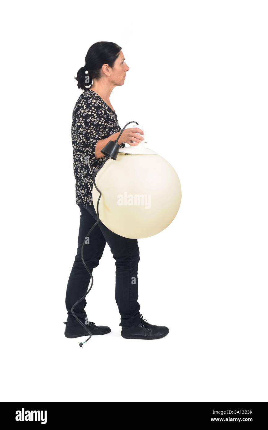side view of a woman carrying lamp on white background Stock Photo - Alamy