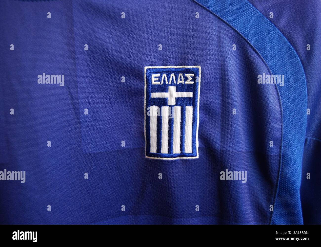 Close up photo of the Greece badge on the home shirt Stock Photo - Alamy