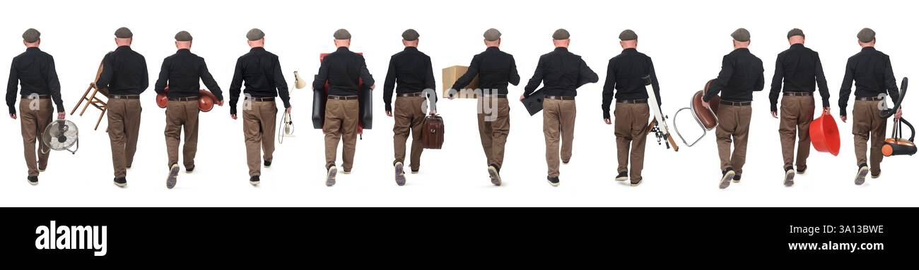 line of back view of the same man walking carrying various objects from ...