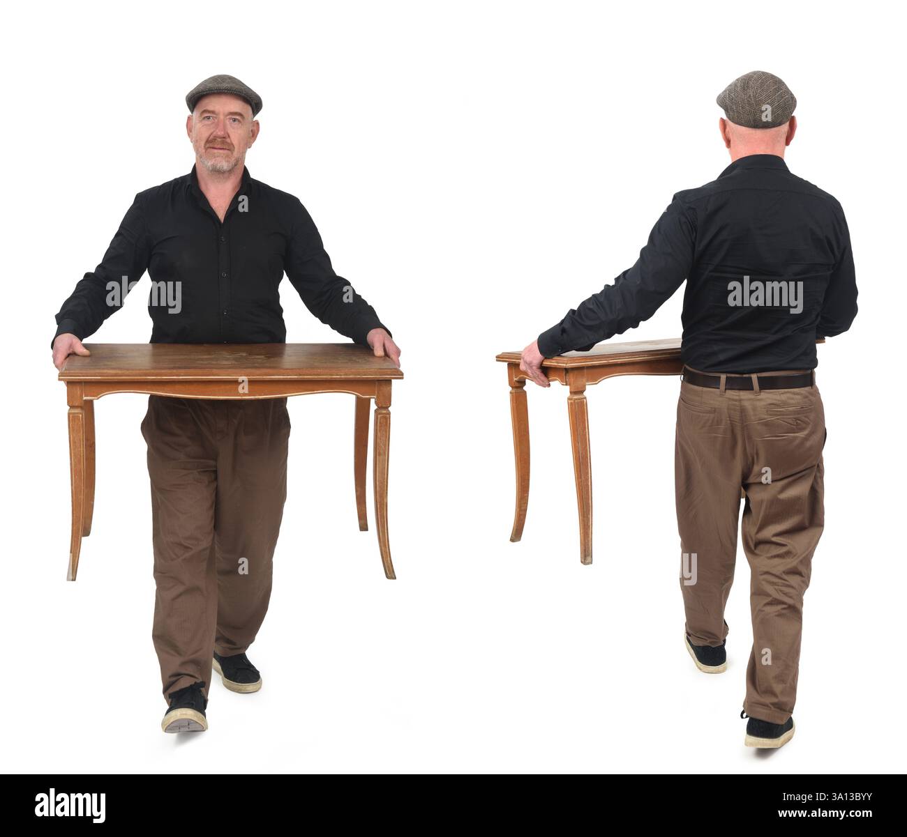 front and back view of a walking man carrying old table on white ...