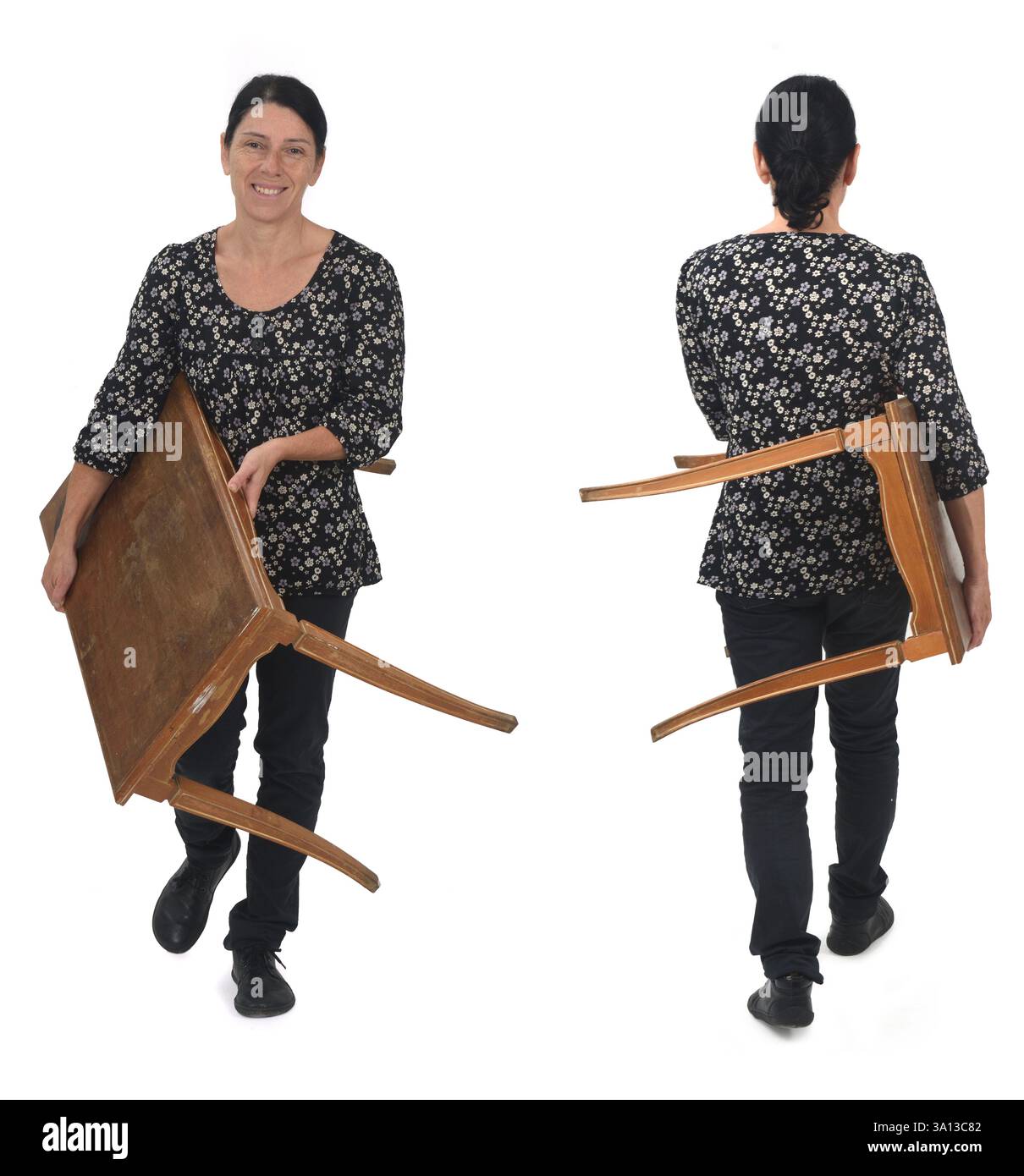 front and back view of a woman carrying old table on white background ...