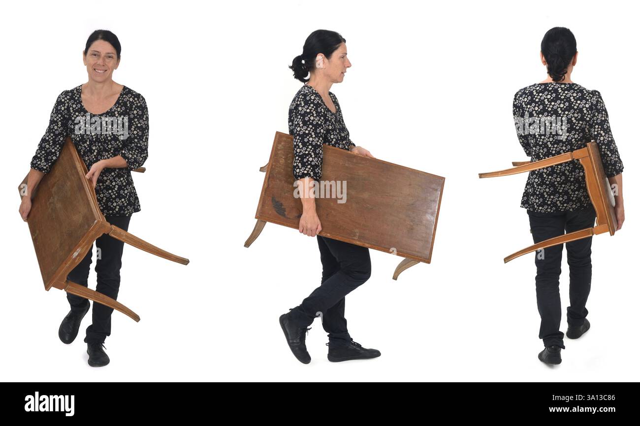 various poses of a woman carrying old table on white background Stock ...