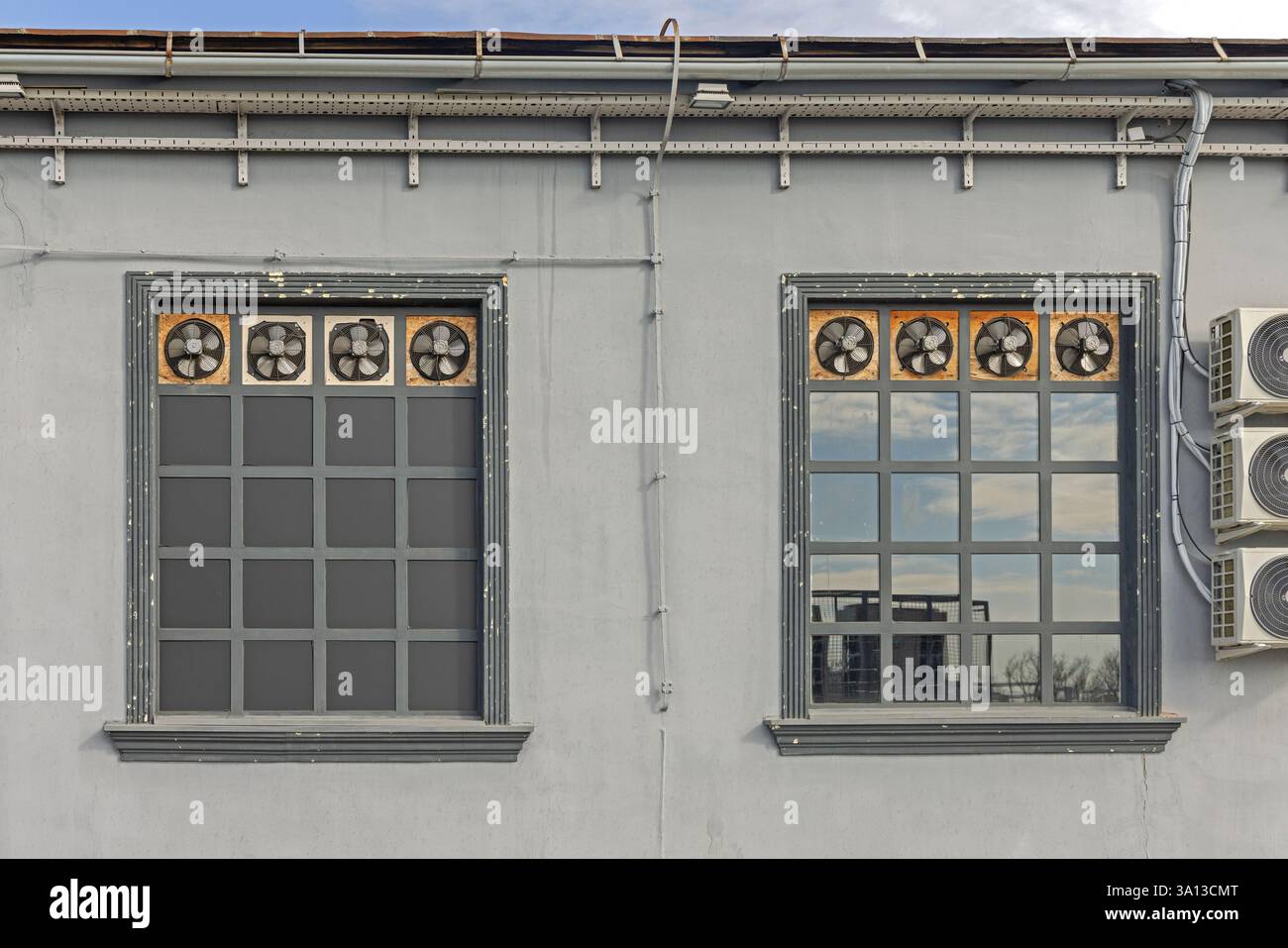 Built in Row of Fans for Air Flow at Dark Tinted Windows Industrial ...