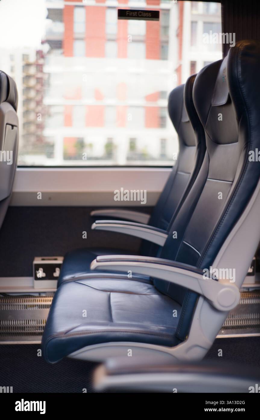 Empty first class seats on SWT coming into Waterloo Stock Photo - Alamy