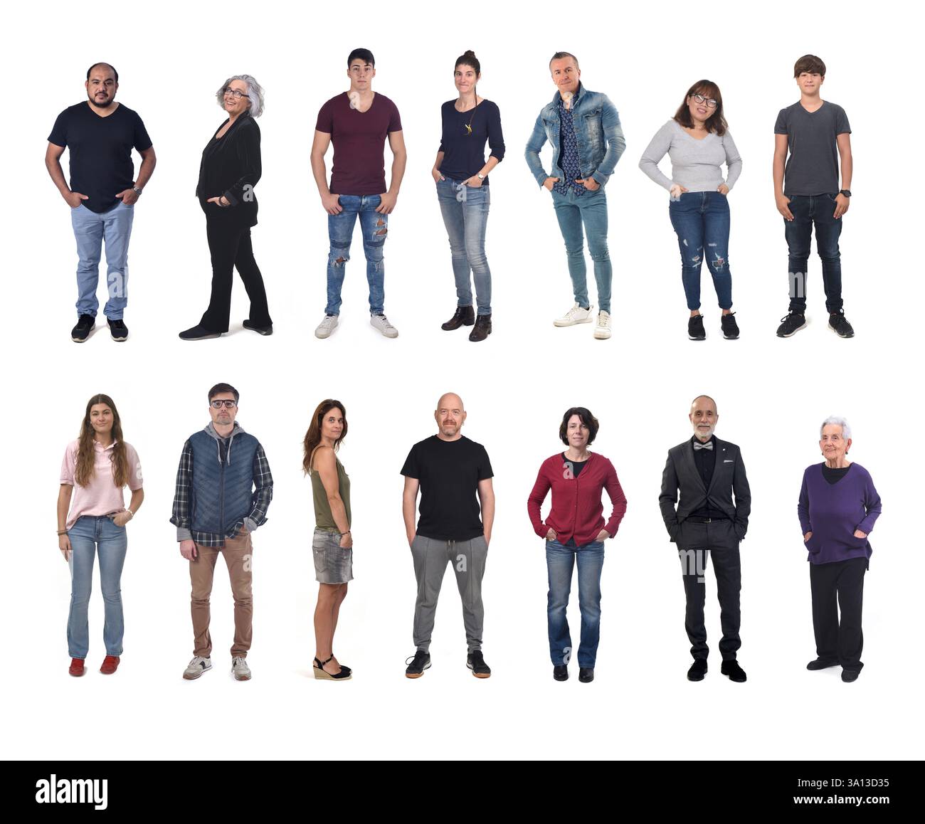 group of men and woman with hands in pockets on white background Stock ...