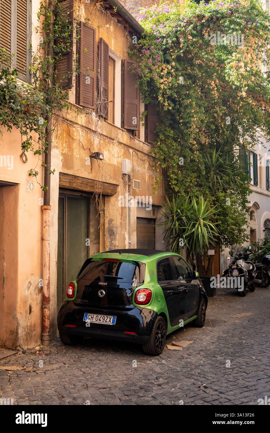 Smart Car parked in a narrow street in Rome Stock Photo - Alamy