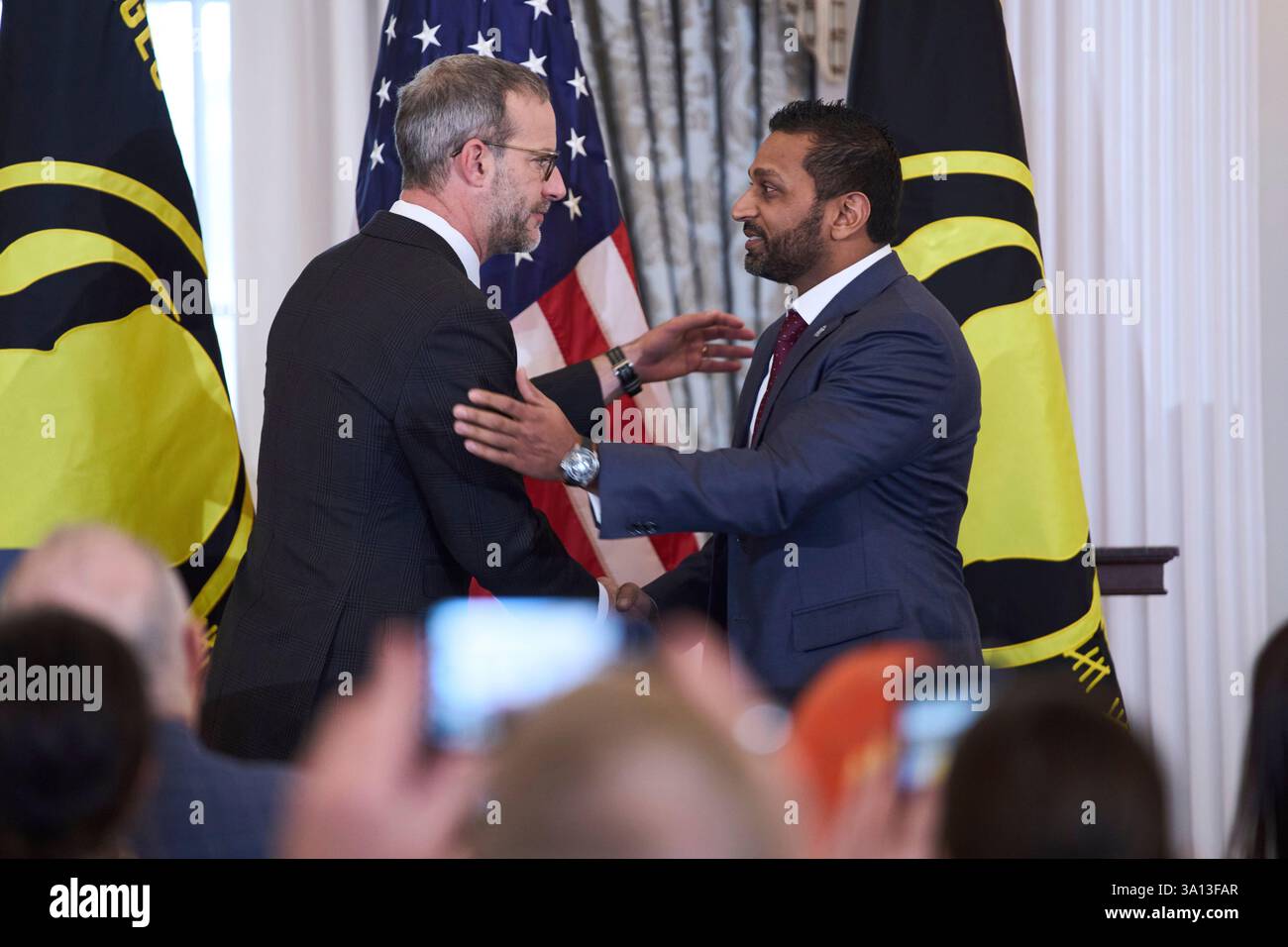 U.S. presidential envoy for hostage affairs Adam Boehler, left, shakes ...