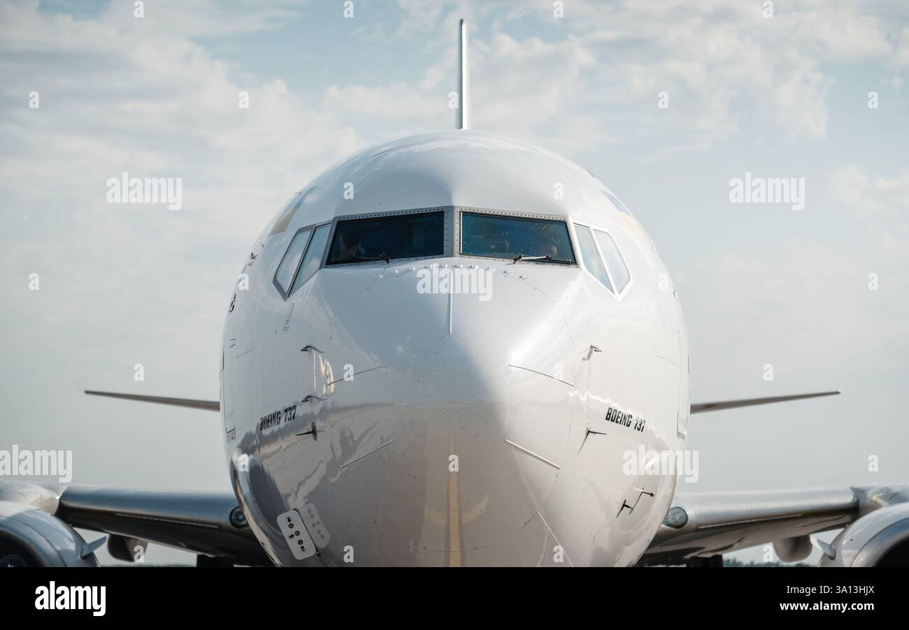 Boeing 737 (UR-UBC) parked near the gate at the airport, close up view ...
