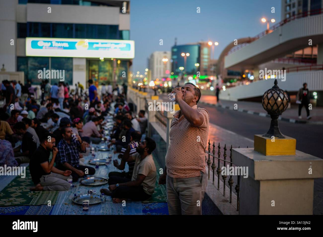 Muslims break their fast during the Muslim's holy fasting month of ...
