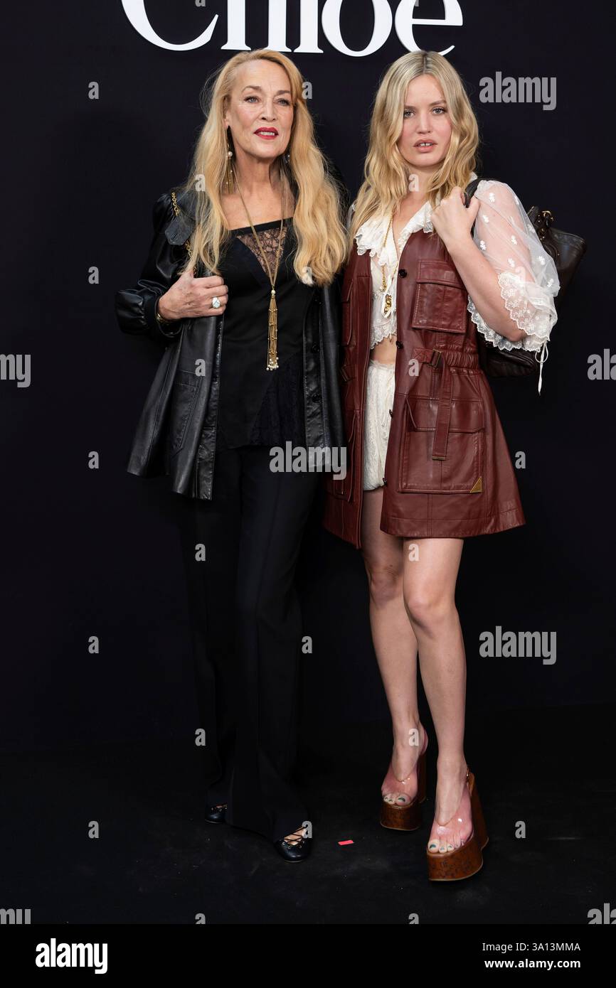 Jerry Hall, left, and Georgia May Jagger pose for photographers before ...