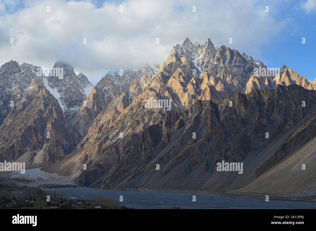 Passu Cones, Upper Hunza, stand tall with their rugged, pointed peaks ...