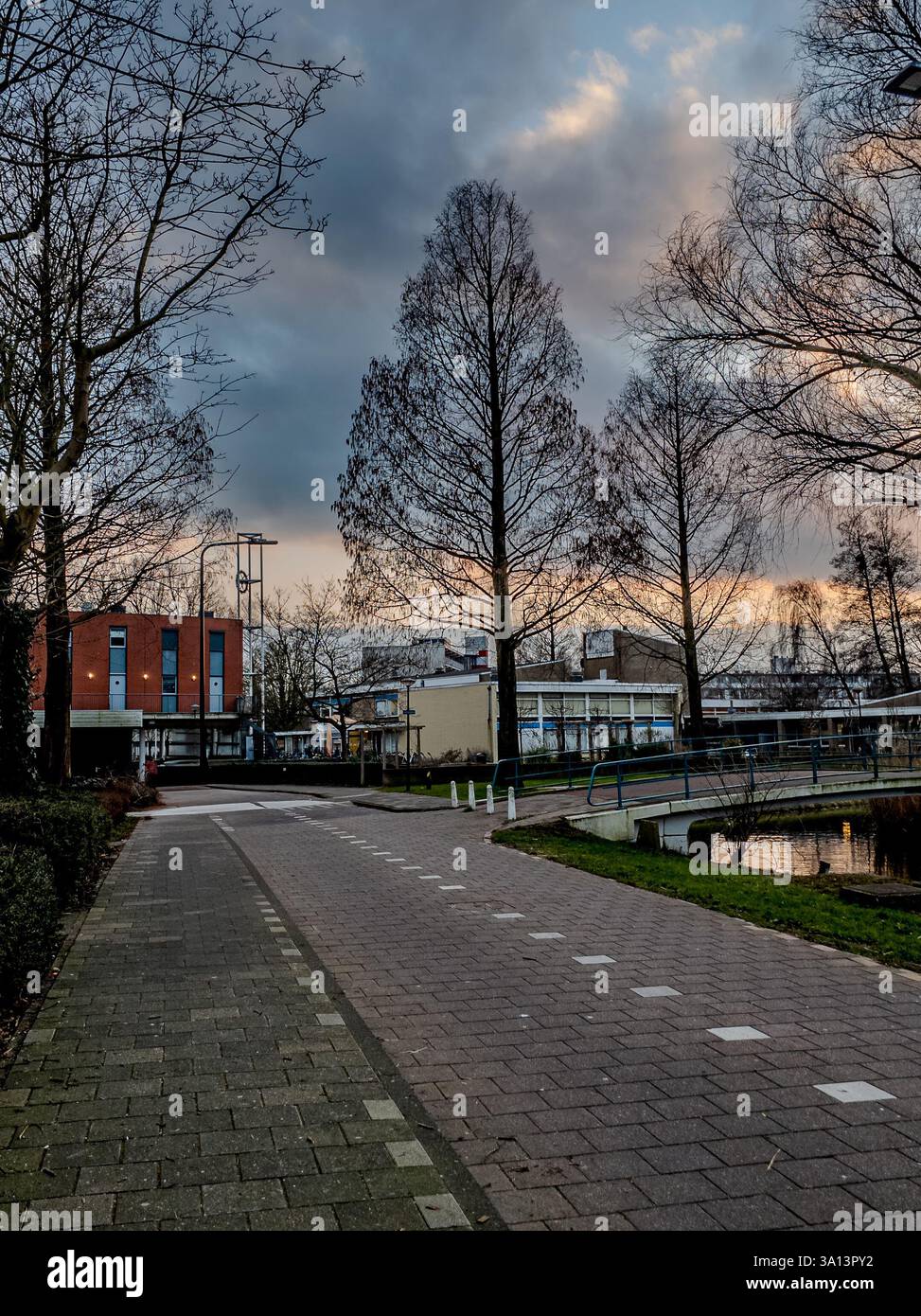 Serene canal pathway lined lush hi-res stock photography and images - Alamy