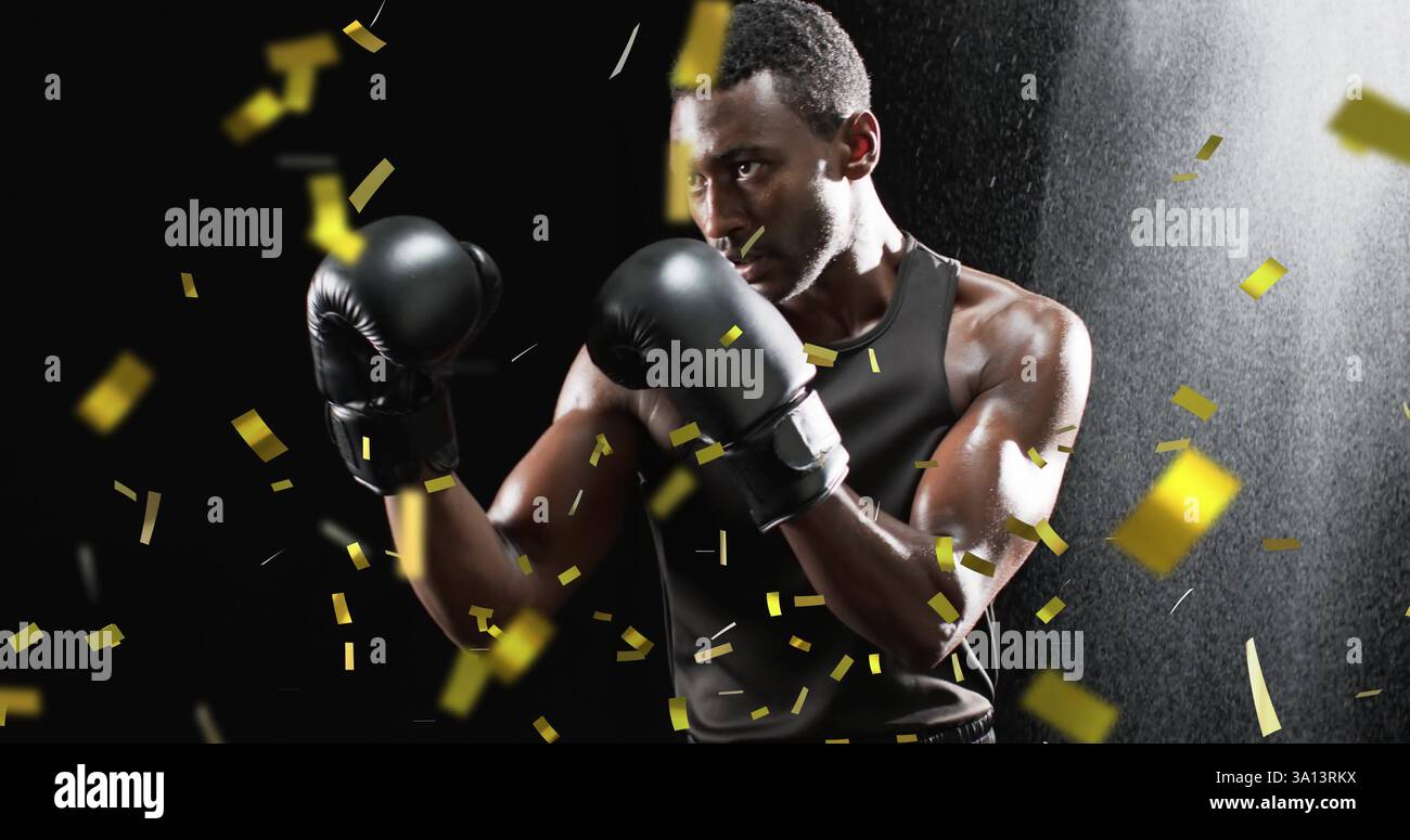 Image of confetti falling over african american male boxer on black ...