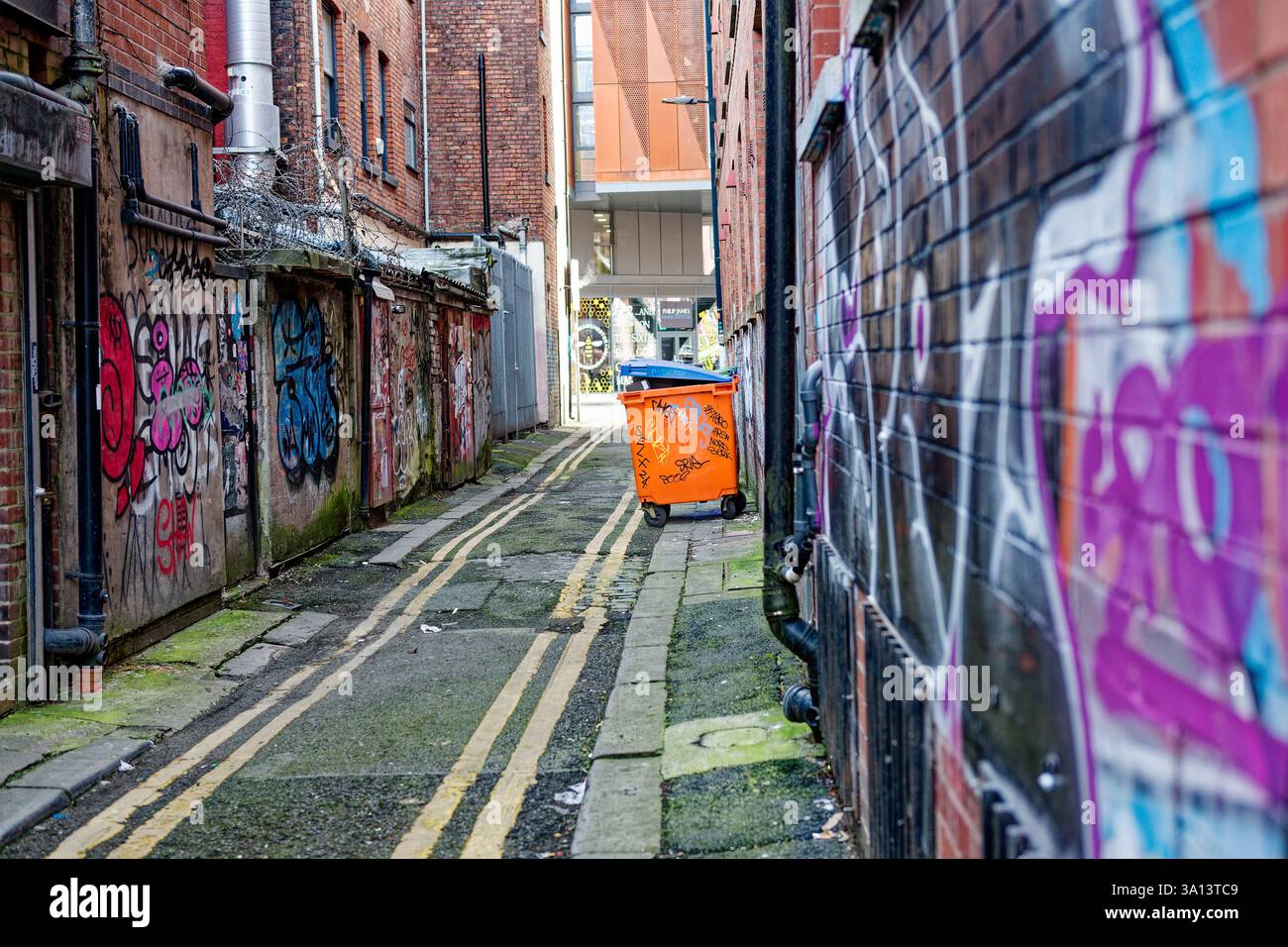 Ancoats, Manchester, UK, 03-01-2025: Graffiti covered alleyway Ancoats ...