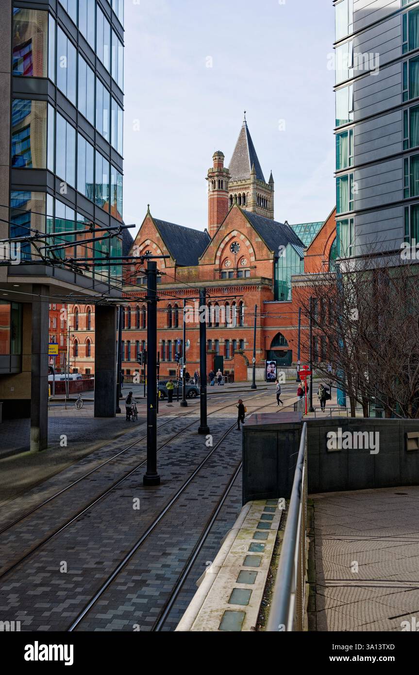 Manchester, UK, 03-01-2025: Manchester City street with a tram track ...