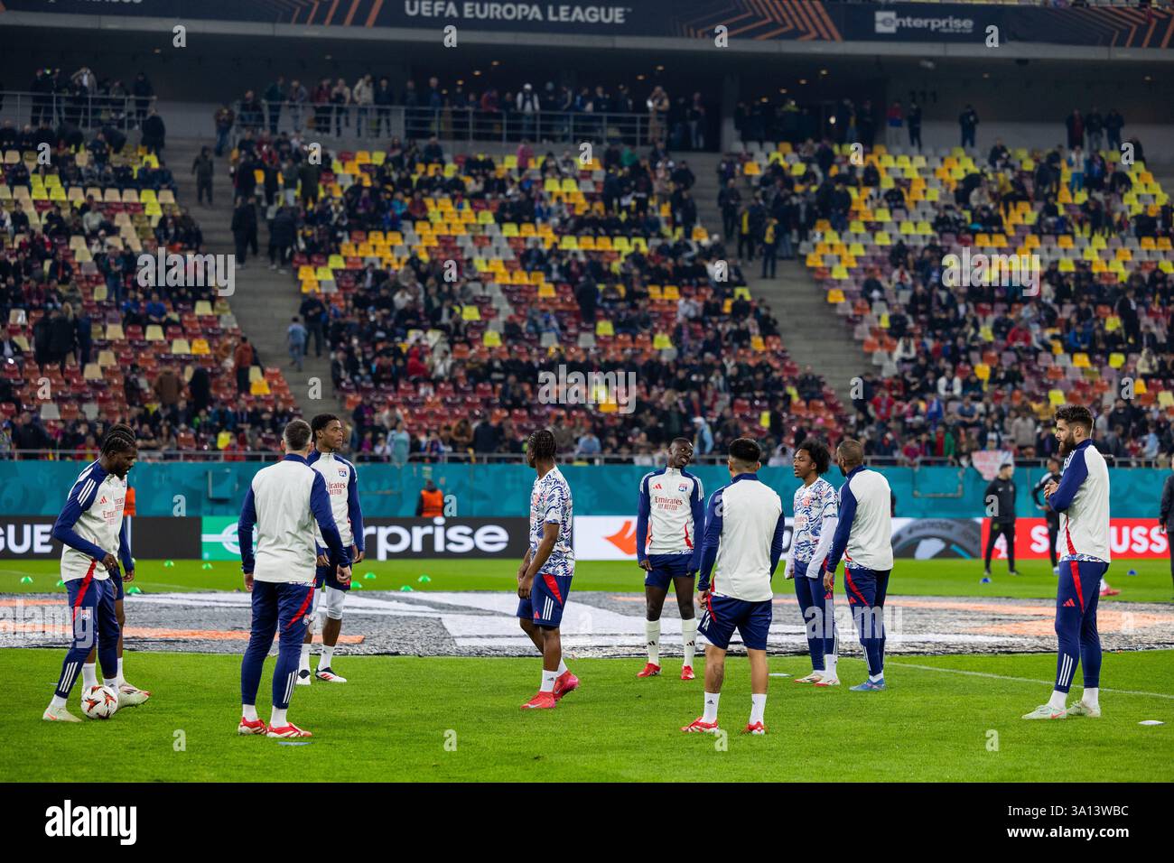 Lyon squad warming up before the UEFA Europa League, Round of 16, 1st ...