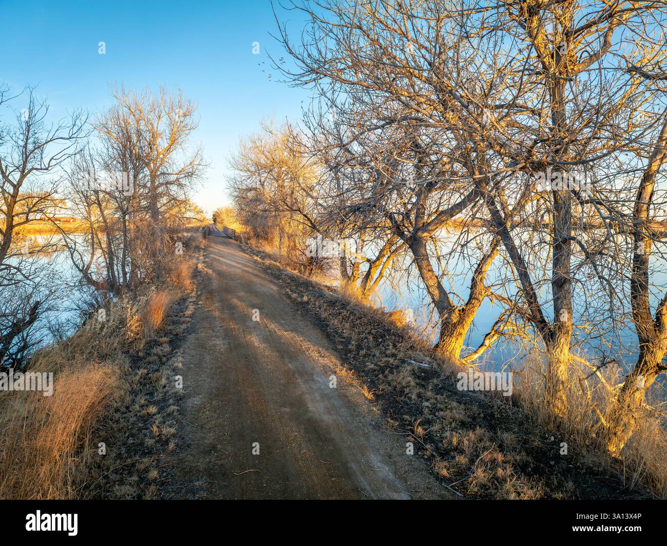 bike path at Roulard Lake near Severance, Colorado in winter scenery - Great Western Bike Trail ...