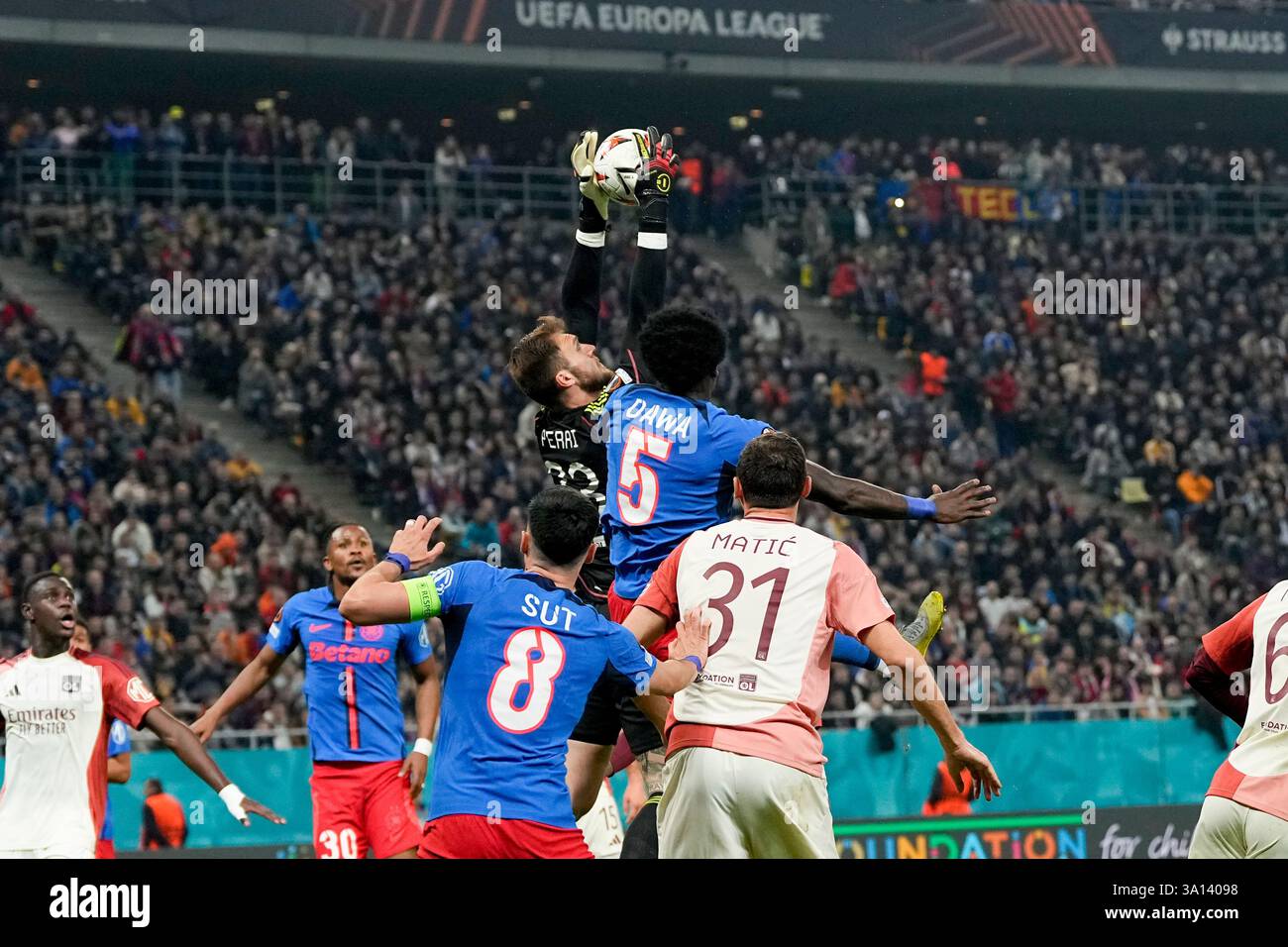 Lyon's goalkeeper Lucas Perri catches the ball during the Europa League ...