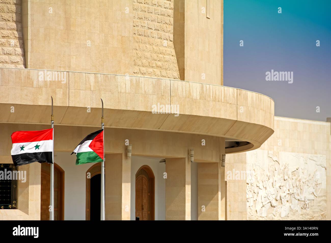 A monumental stone structure featuring intricate decorative reliefs ...