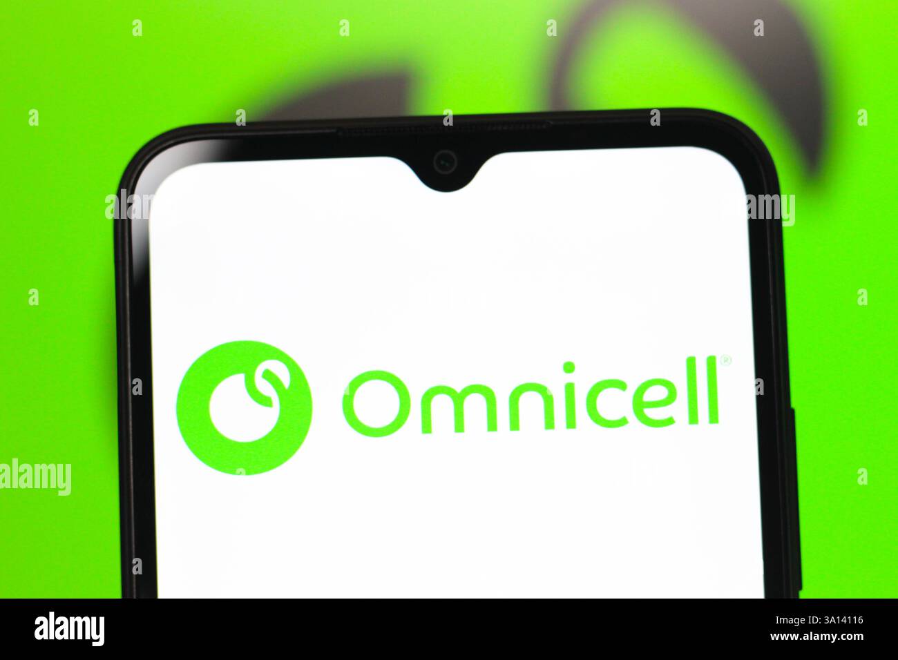In this photo illustration, the Omnicell logo is seen displayed on a smartphone screen Stock ...