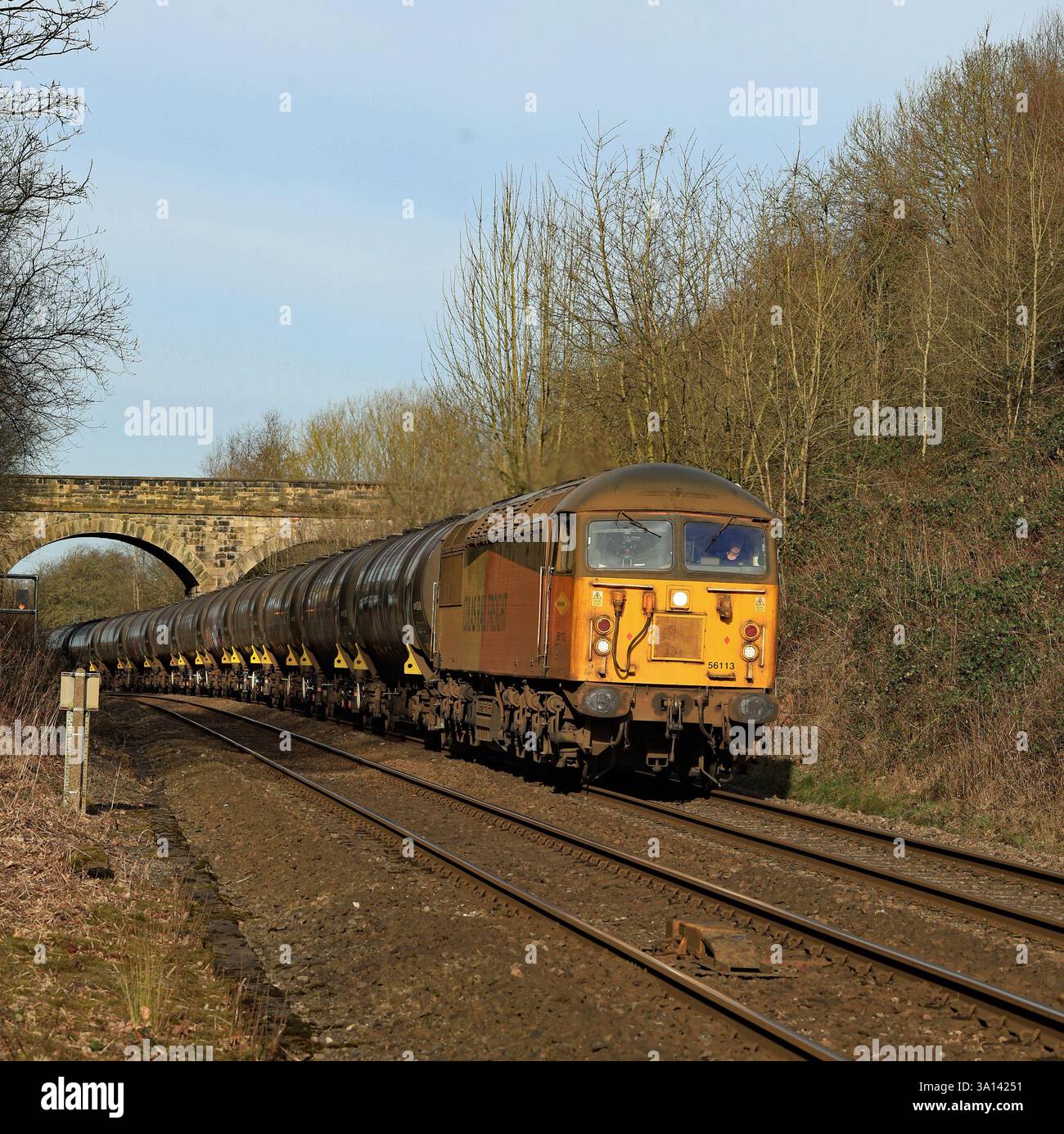 A Colas diesel locomotive tops the rise under Chapel Lane bridge near ...