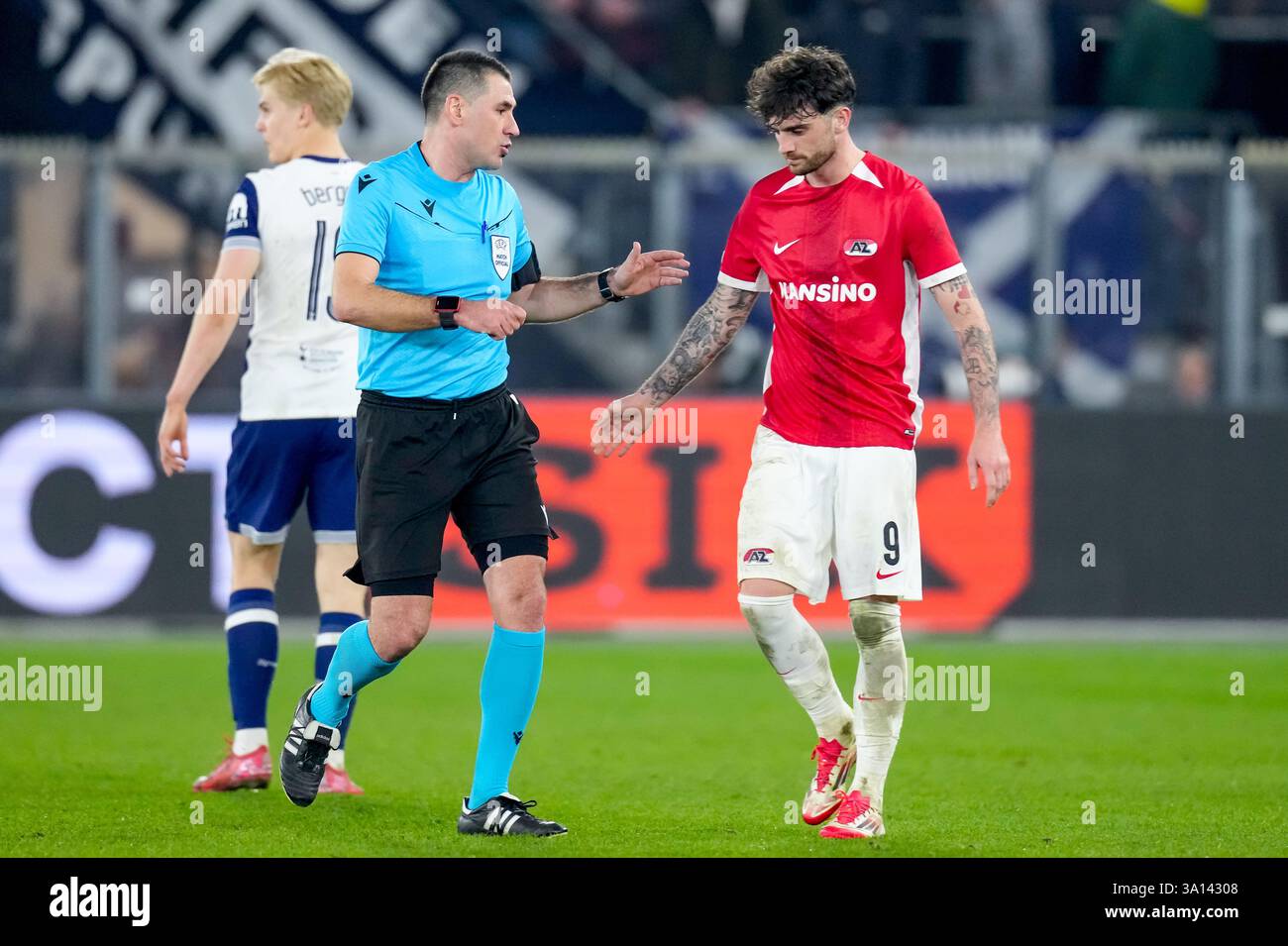 ALKMAAR, NETHERLANDS - MARCH 6: Referee Rade Obrenovic talks to Troy ...