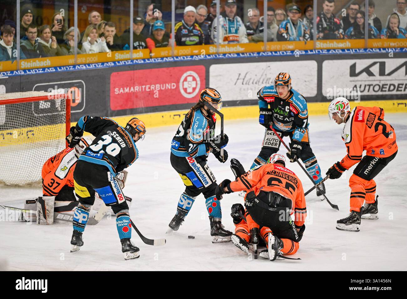 LINZ, AUSTRIA -MARCH 6: Jonas Gunnarsson of Graz 99ers, Ian Christopher Scheid of Steinbach ...