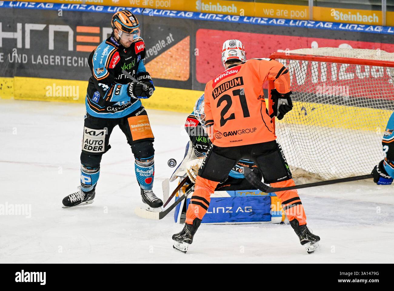 LINZ, AUSTRIA -MARCH 6: Gregory Lee Moro of Steinbach Black Wings Linz, Lukas Haudum of Graz ...