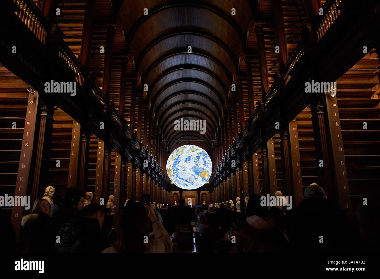 Dublin, Ireland - 01.02.2024: Gaia by Luke Jerram, at the Book of Kells ...