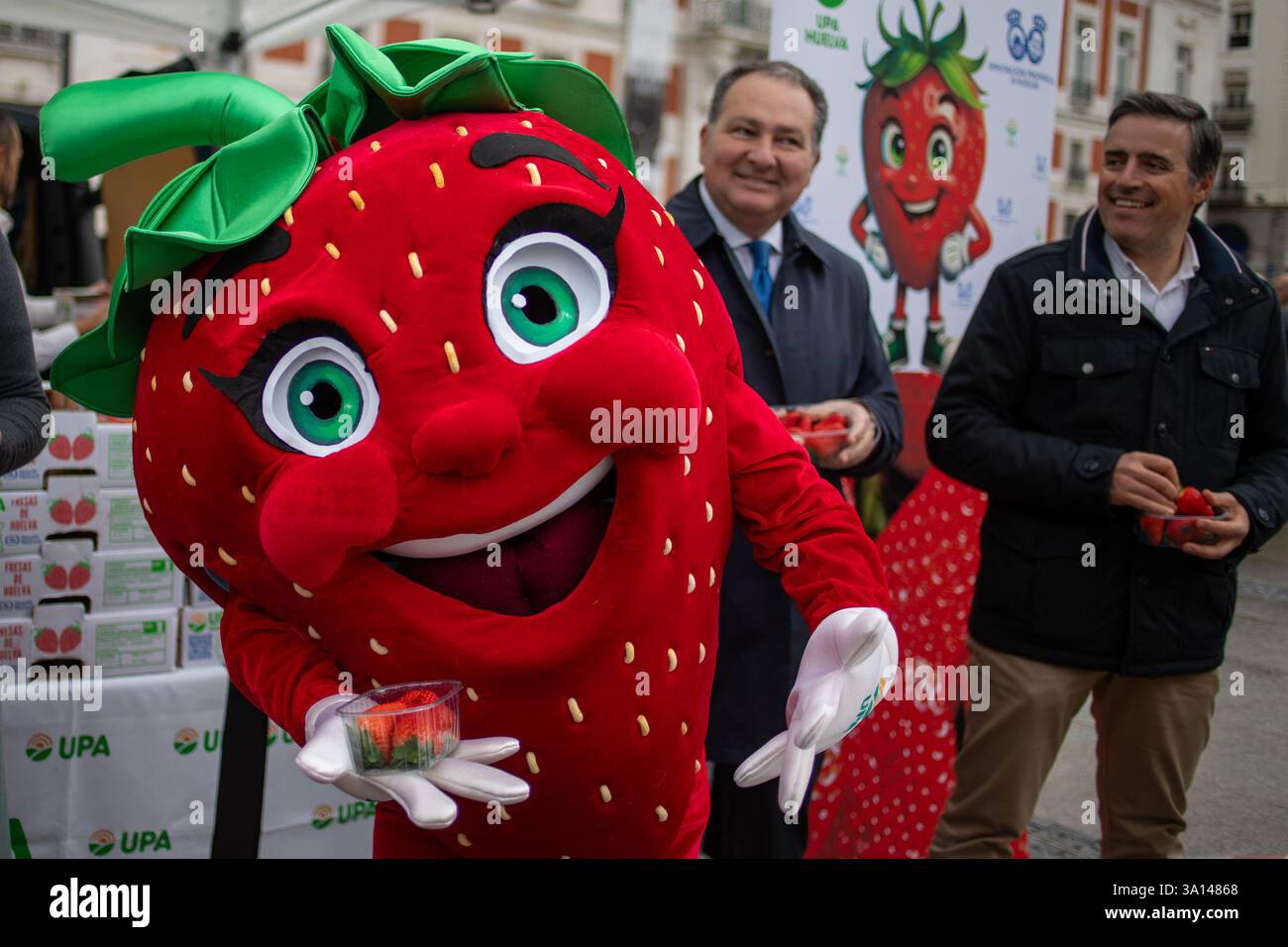 Madrid, Spain. 06th Mar, 2025. A figure dressed as a strawberry poses ...