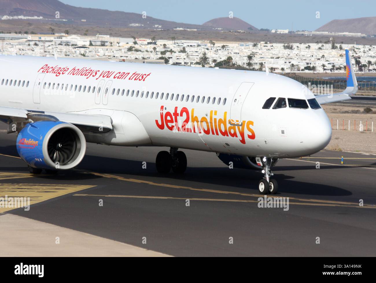An Airbus A321Neo of Jet2 in a Jet2 Holidays livery waits to depart ...